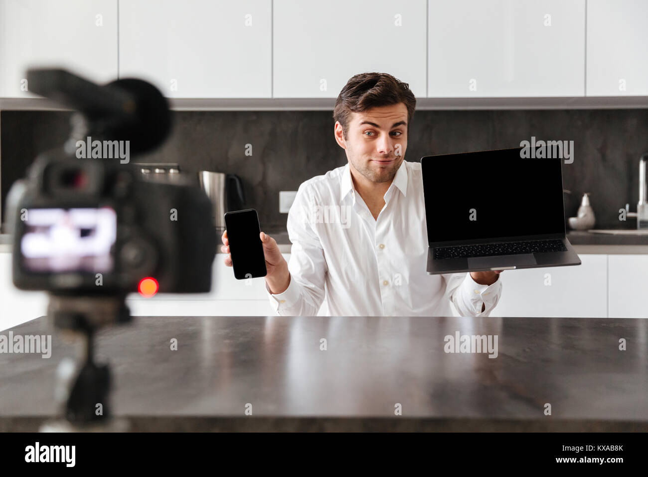 Man filming video with mobile phone hi-res stock photography and images ...