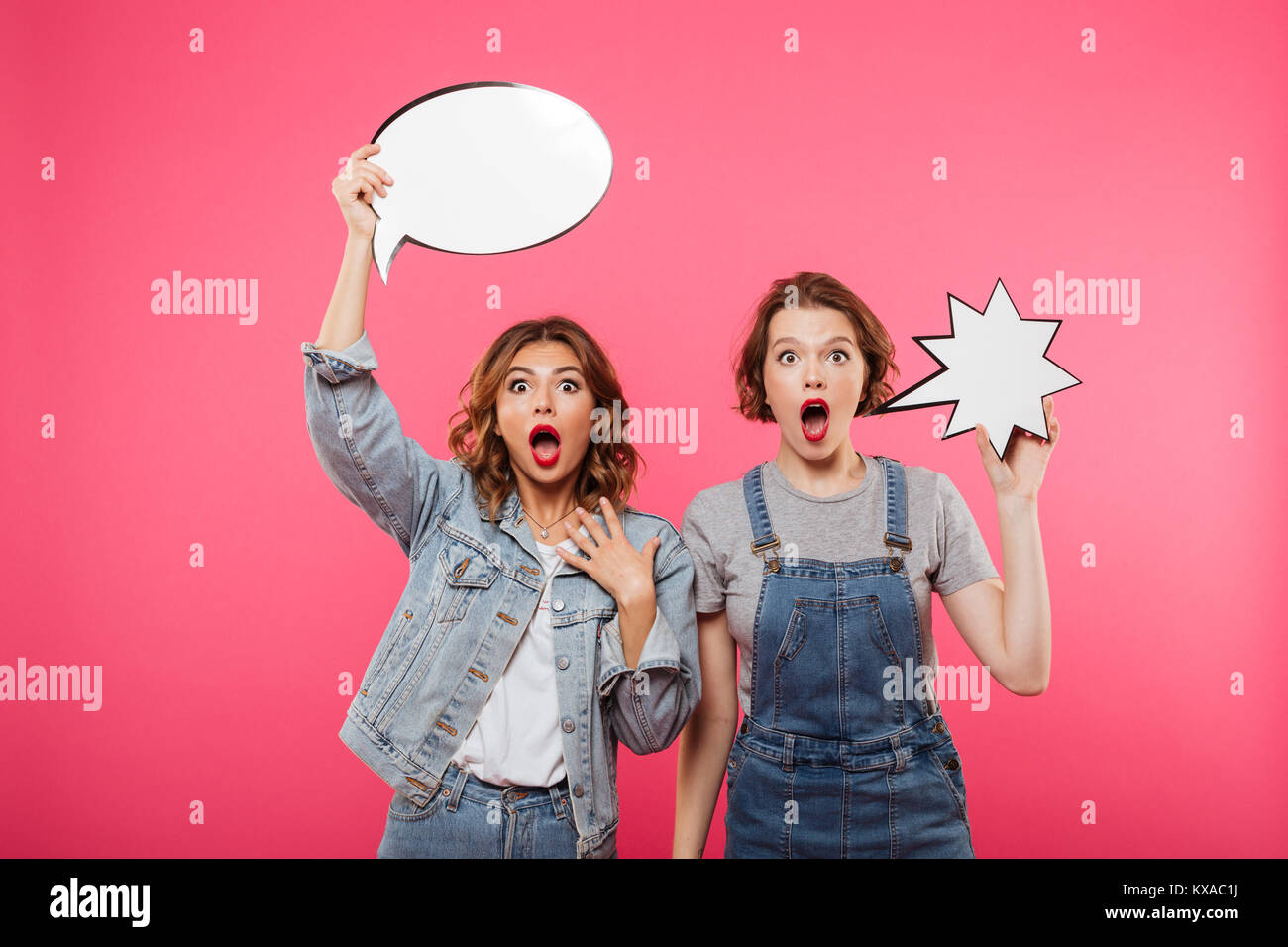 Image of two shocked ladies friends standing isolated over pink ...