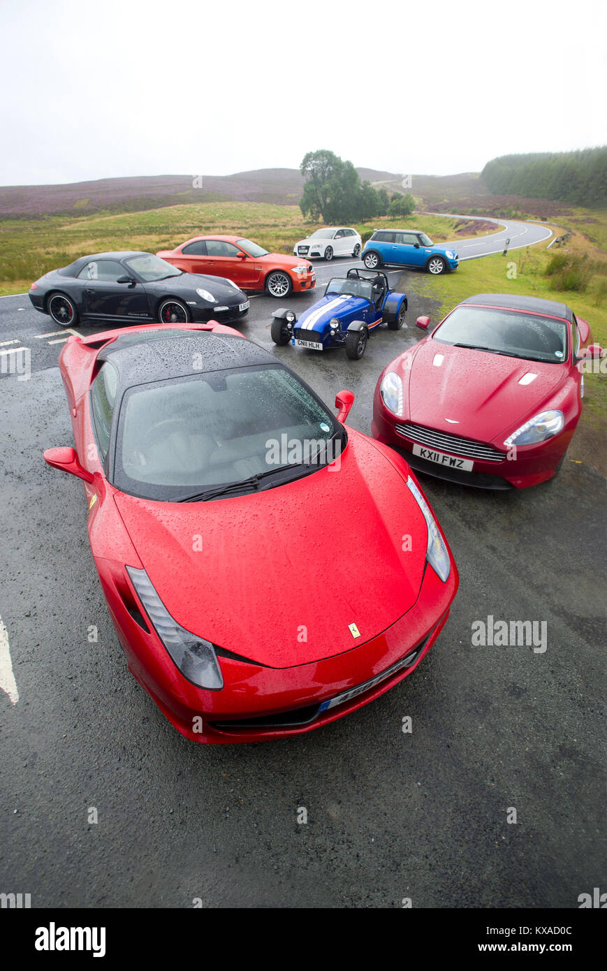 group of exotic and exciting sports cars-Ferrari 458, Aston Martin DB9 ...