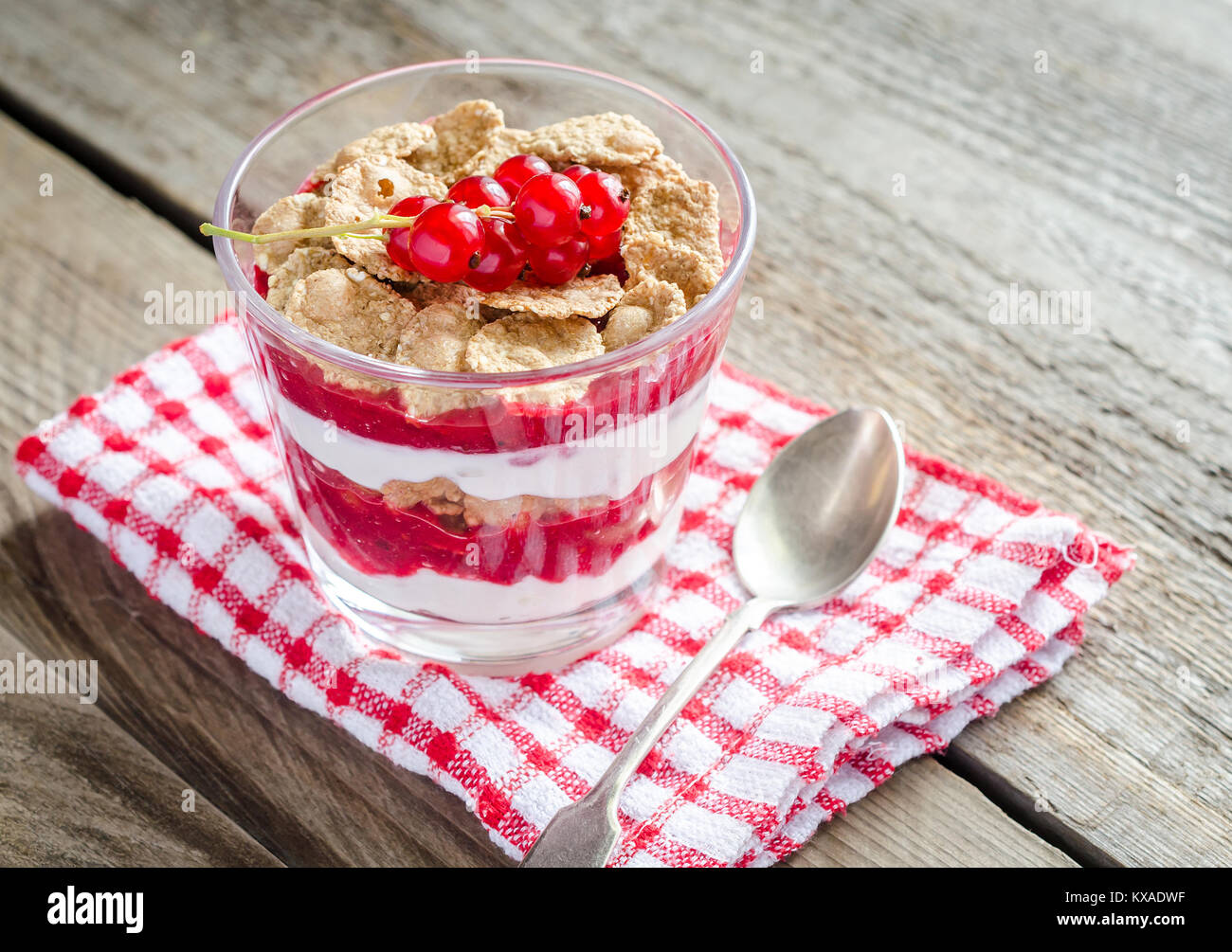 Wholegrain muesli with berry sauce and yogurt Stock Photo - Alamy