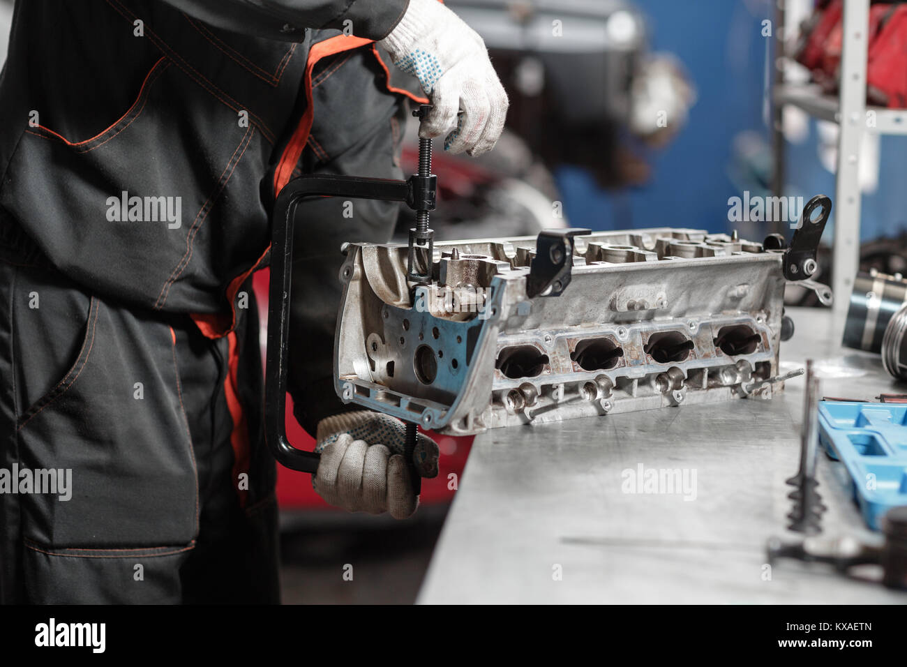 the mechanic opened the locking valve mechanism. Disassemble engine ...