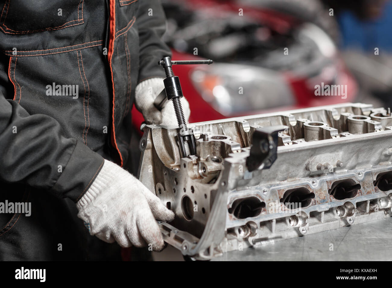 the mechanic opened the locking valve mechanism. Disassemble engine ...