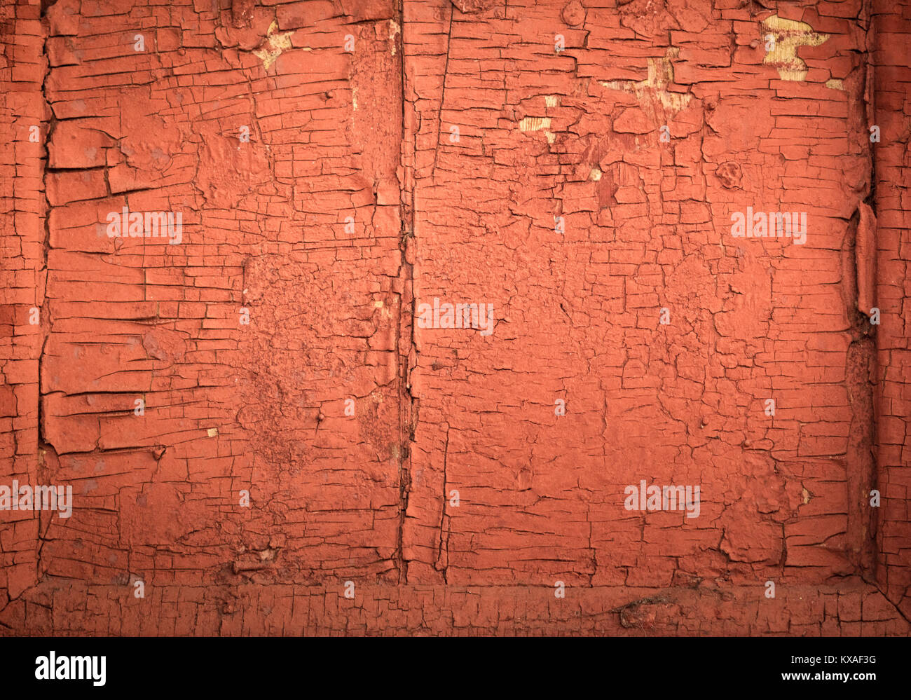 Cracked red old wall of red color close-up Stock Photo - Alamy