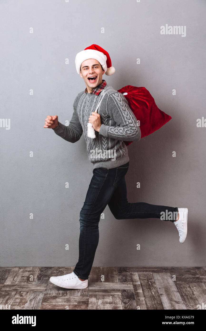 Man looking over shoulder running hi-res stock photography and images ...