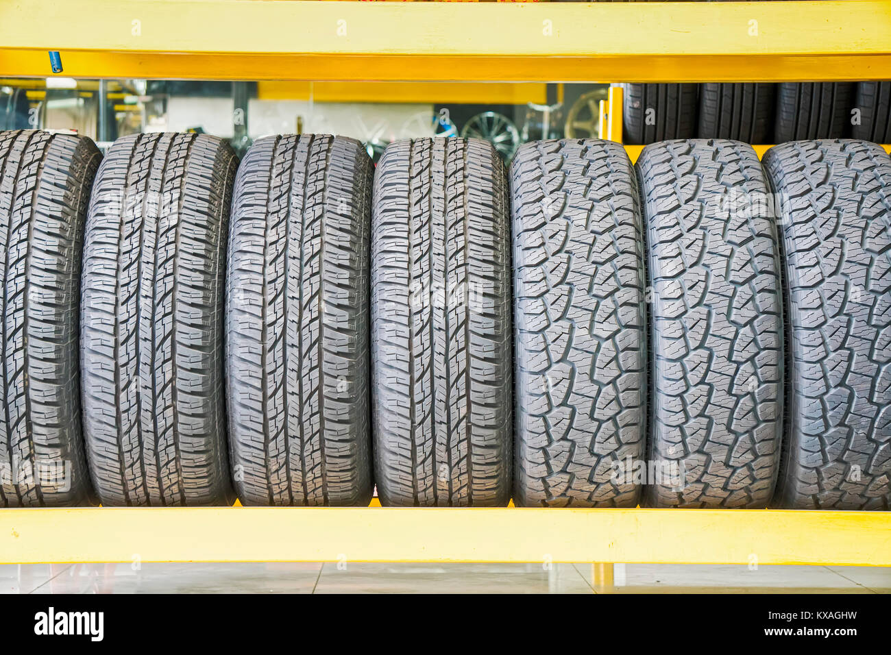 Car tires at warehouse in tire store Stock Photo - Alamy
