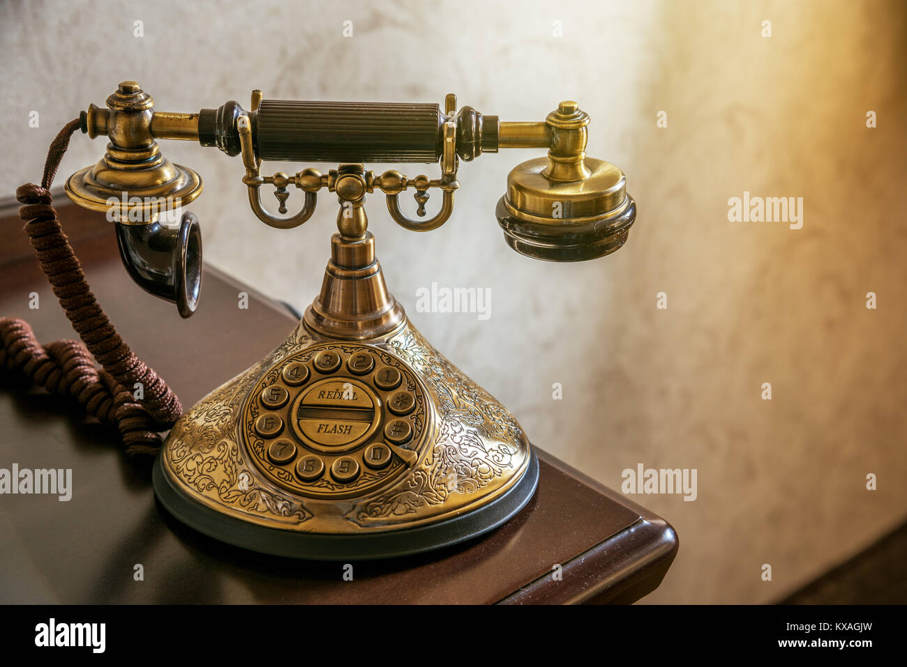Old telephone on wooden background Stock Photo - Alamy
