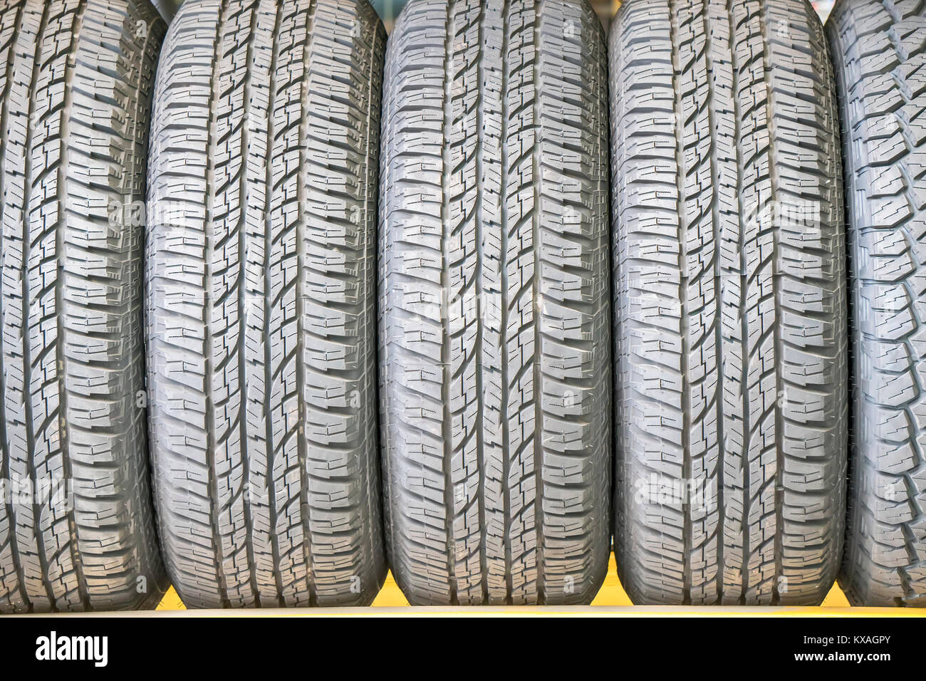 Car tires at warehouse in tire store Stock Photo - Alamy