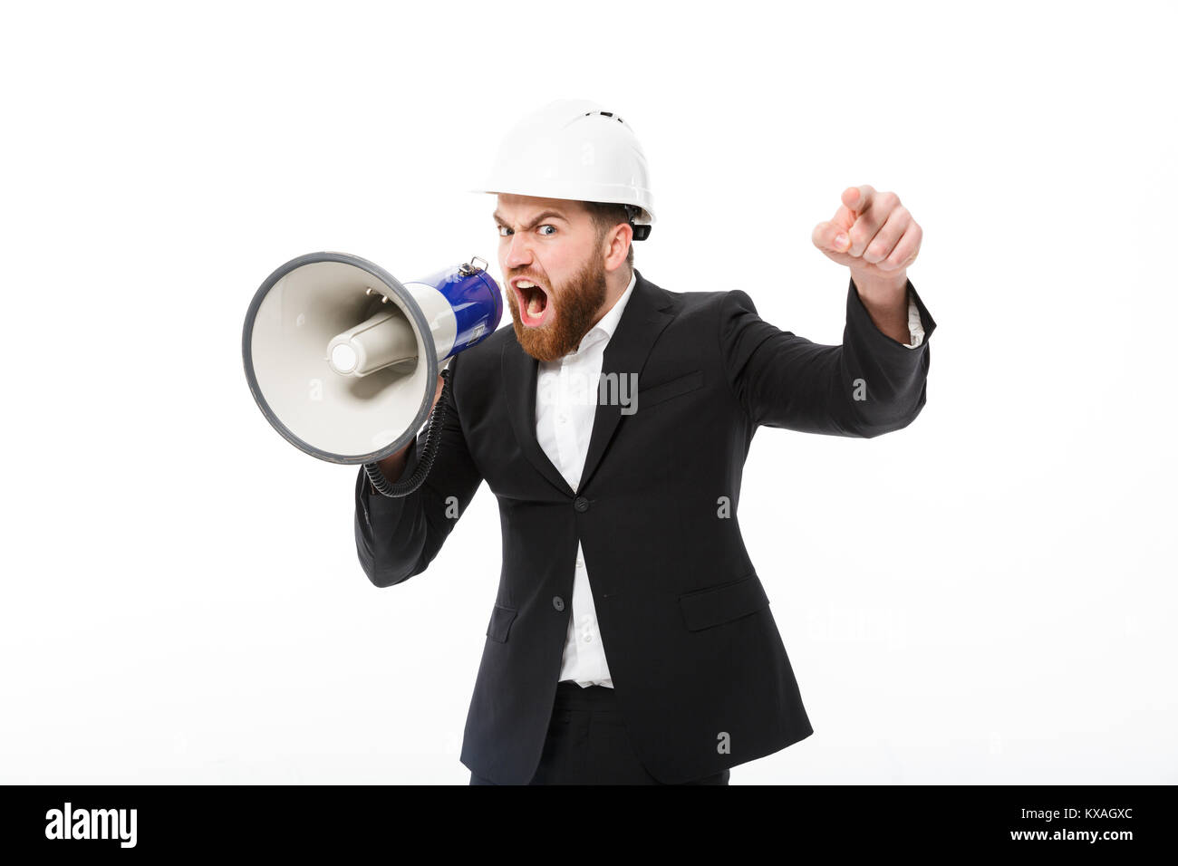 Angry bearded business man in protective helmet screaming in megaphone ... Angry bearded business man in protective helmet screaming in megaphone ...