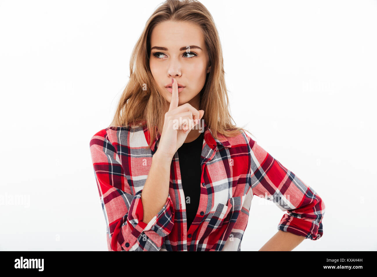 Finger over lip hi-res stock photography and images - Alamy