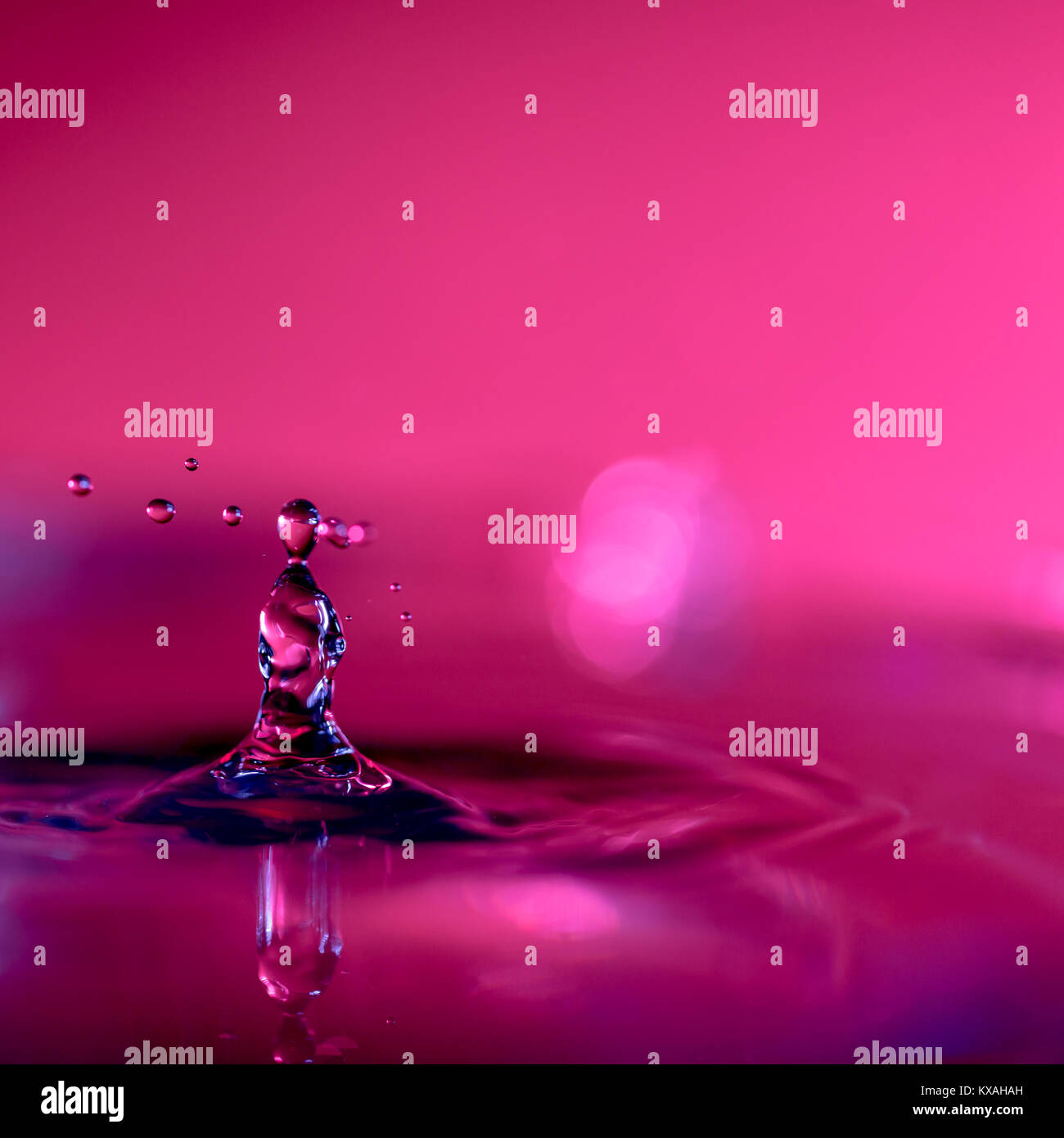 Photograph of Water droplets with a coloured background. also known as ...