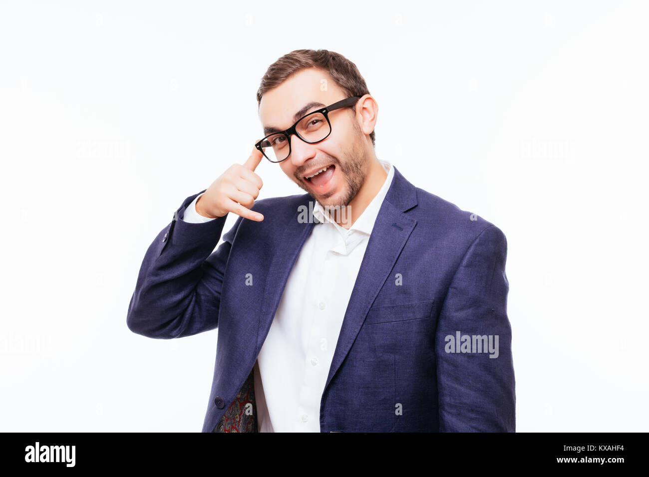 Handsome business man showing contact gesture isolated on white ...