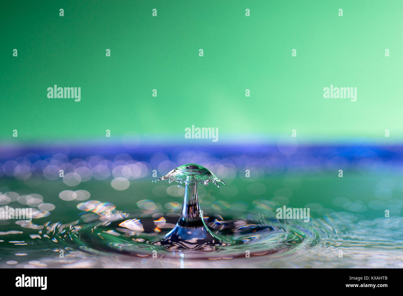 Photograph of Water droplets with a coloured background. also known as ...