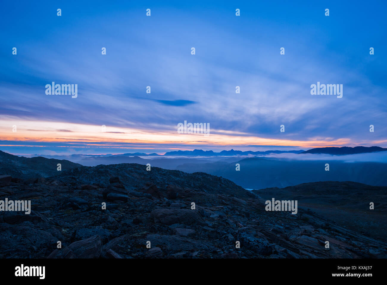 Rocky landscape, mountain ranges at dusk, West Greenland, Greenland ...