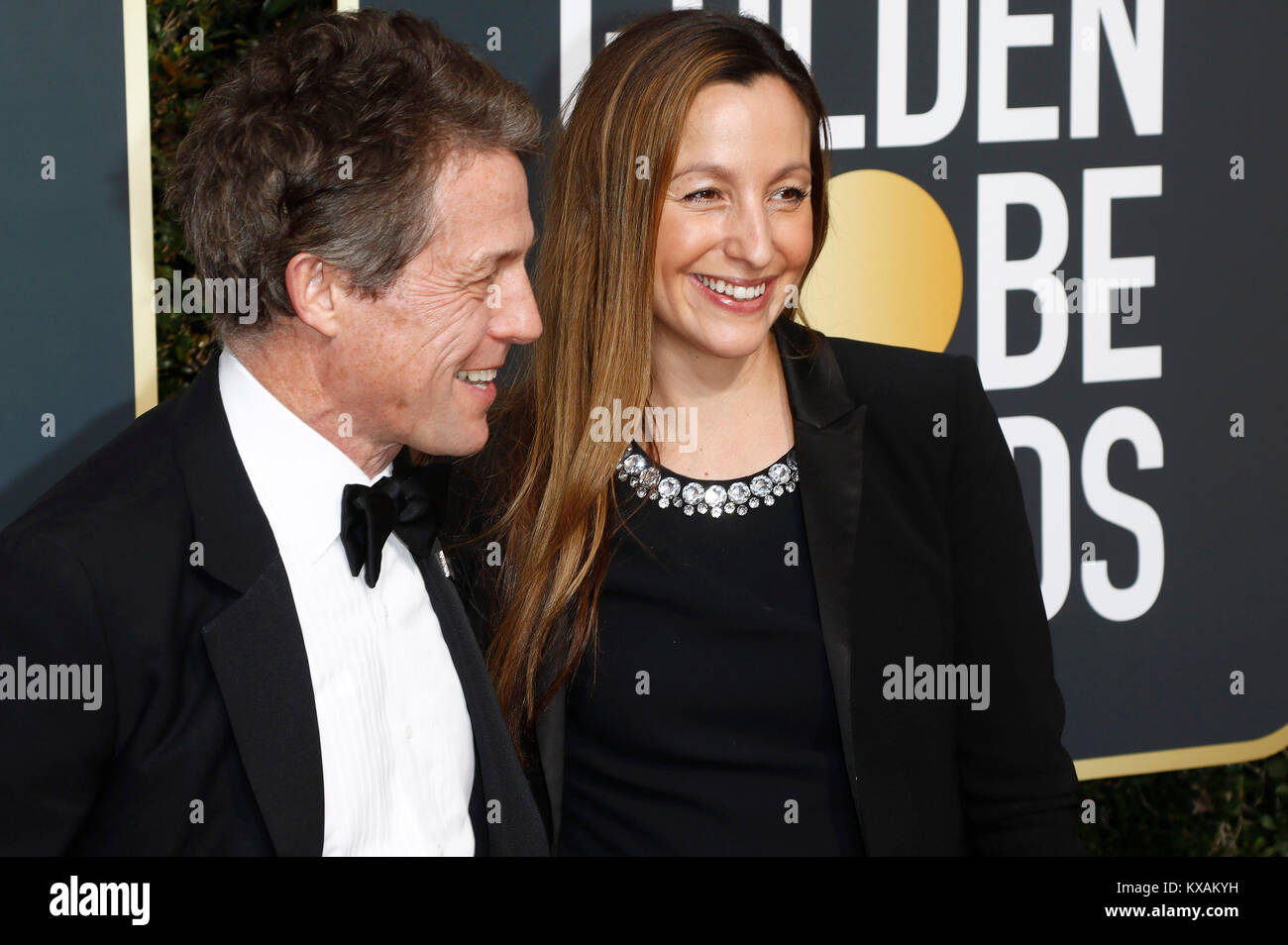 Hugh Grant and his girlfriend Anna Eberstein attend the 75th Annual ...