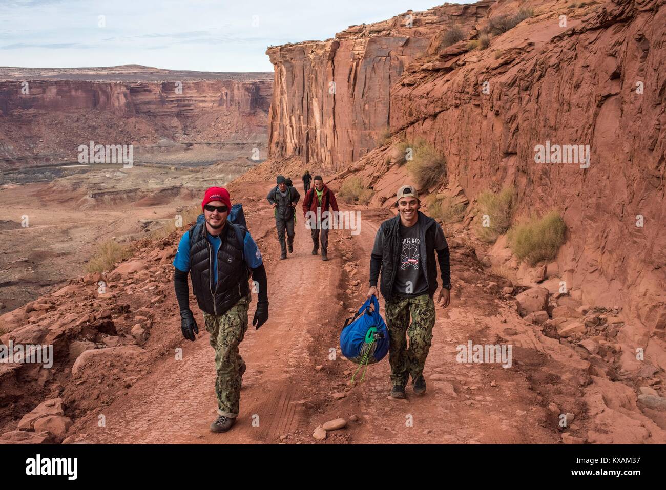 December 4, 2017 - Moab, Utah, U.S - A group of BASE jumpers walk up ...