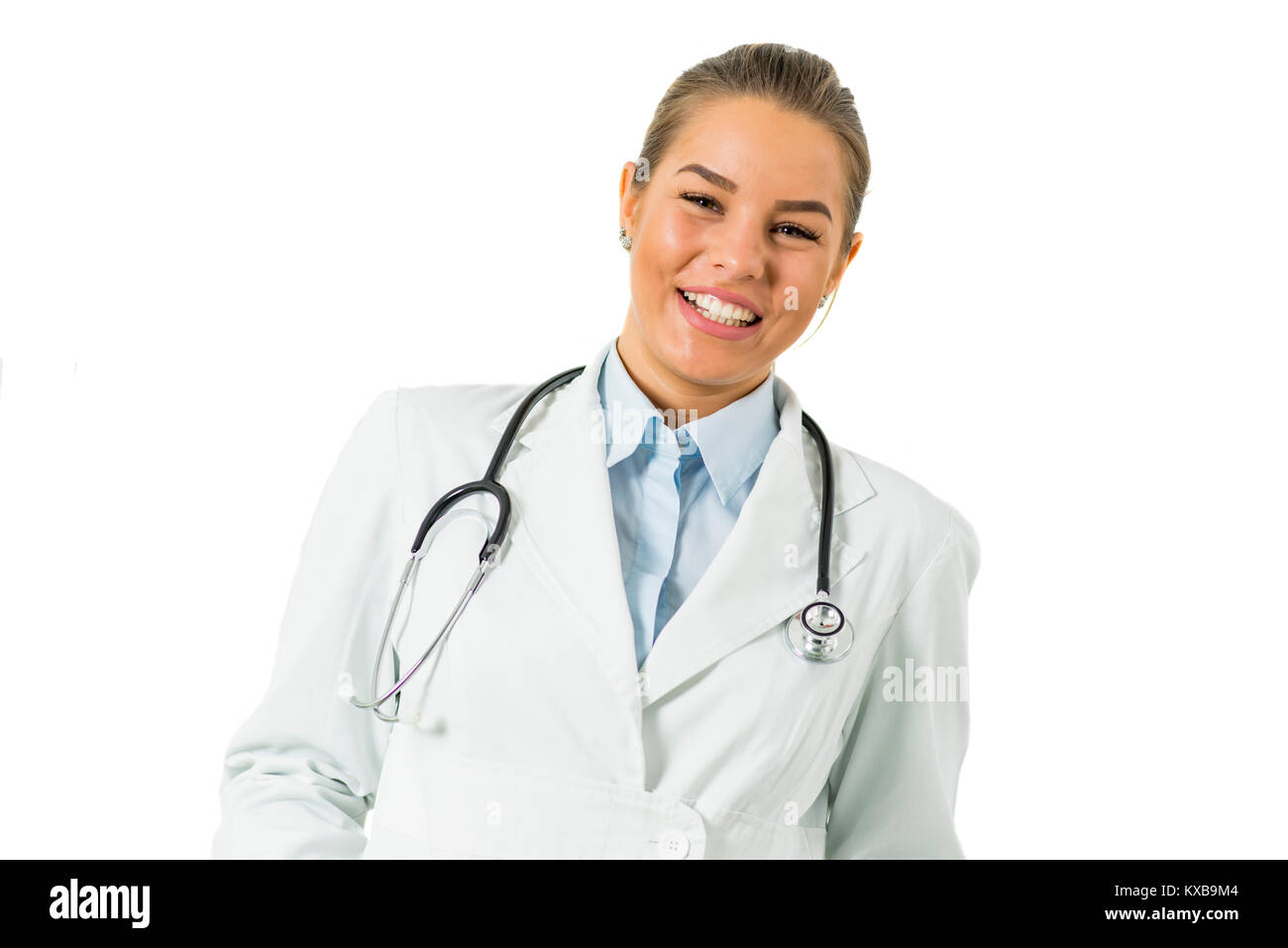 Pretty young smiling female doctor on the white background Stock Photo ...