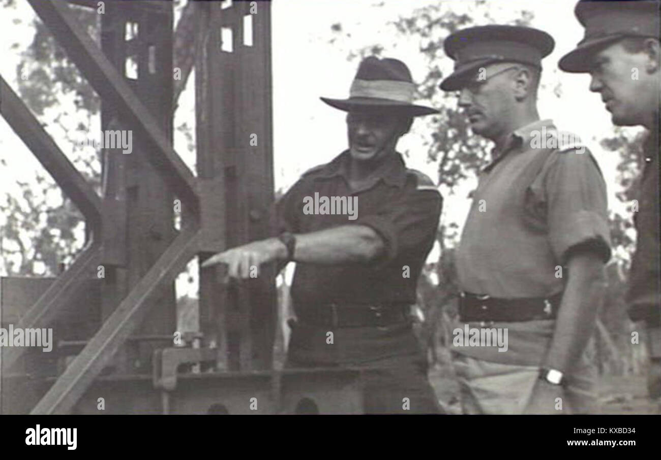 Lieutenant K. Proctor; Brigadier R.J.H. Risson, DSO, OBE; and ...