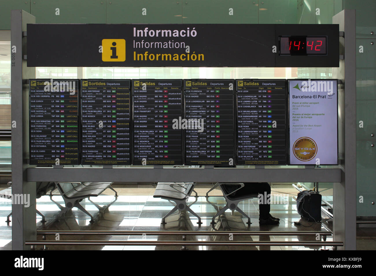 Airport flights information display panel withe passenger on background ...
