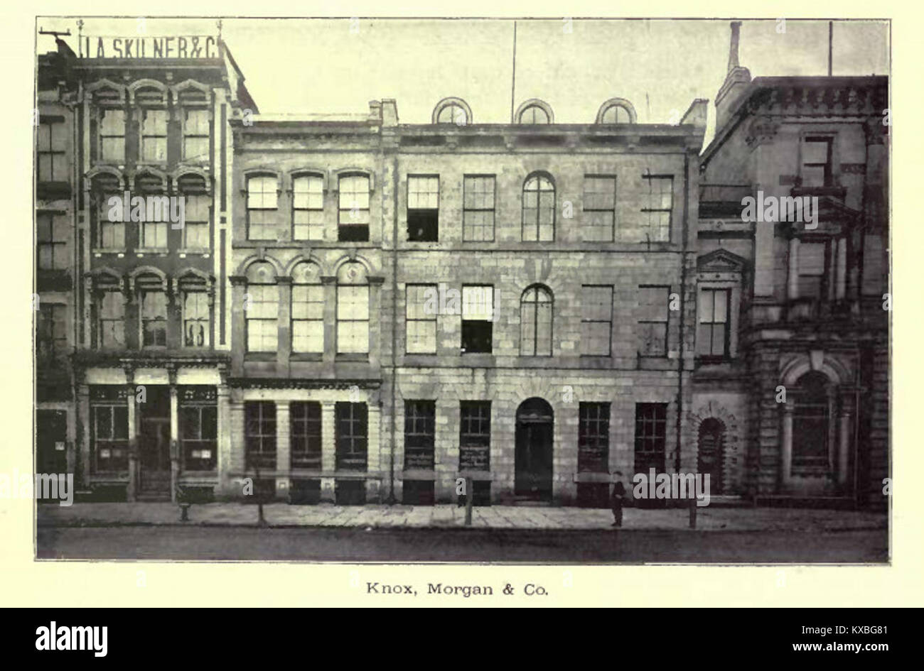 A historical photograph of the buildings at 18-28 King Street East ...