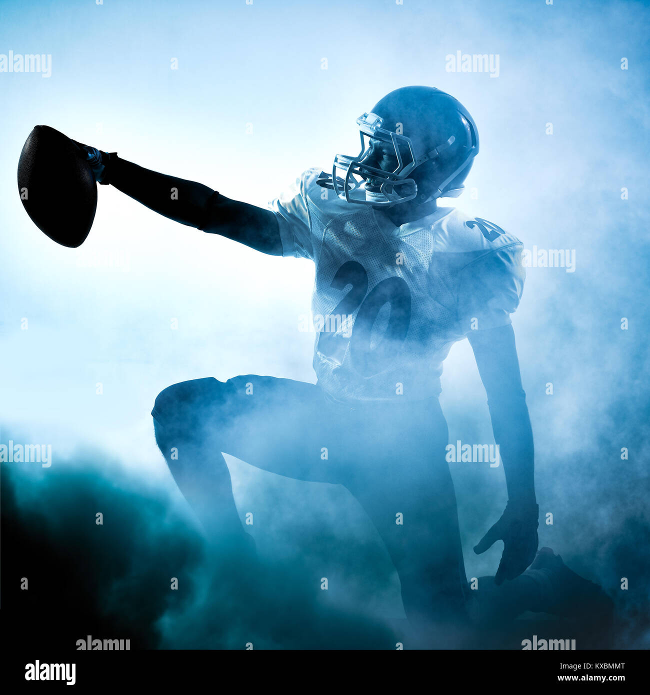 one american football player portrait in silhouette shadow on white ...