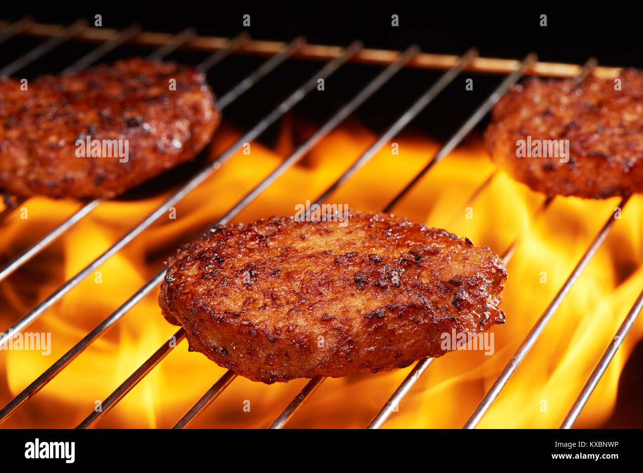 Hamburger fire flame cheeseburger hi-res stock photography and images ...