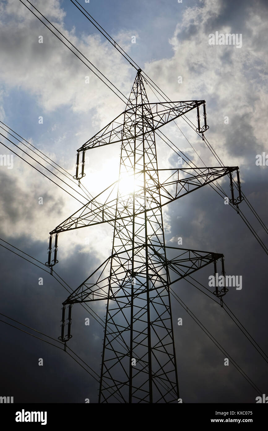 Pylon and wires on the sky in Austria Stock Photo - Alamy