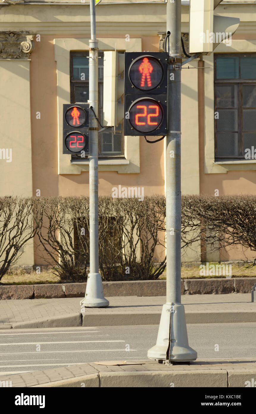 Traffic lights regulate the movement of pedestrians across the roadway ...