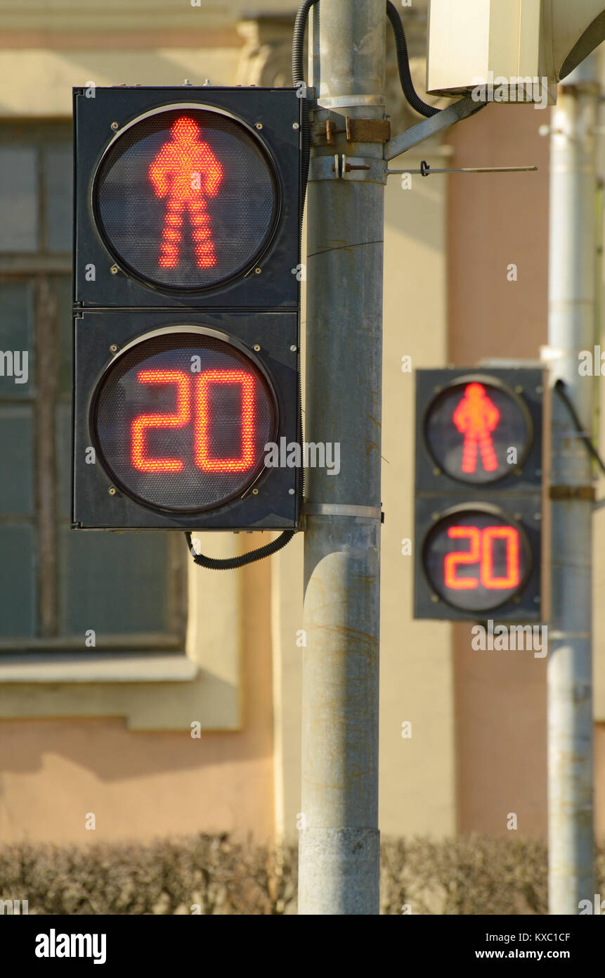 Traffic lights regulate the movement of pedestrians across the roadway ...