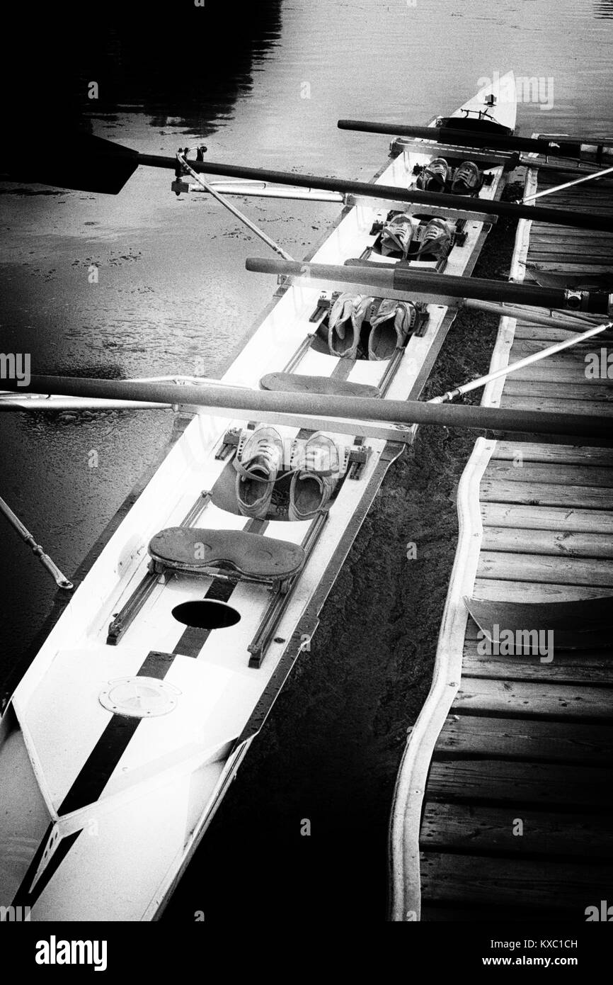 Rowing shell at side of Jetty Stock Photo - Alamy