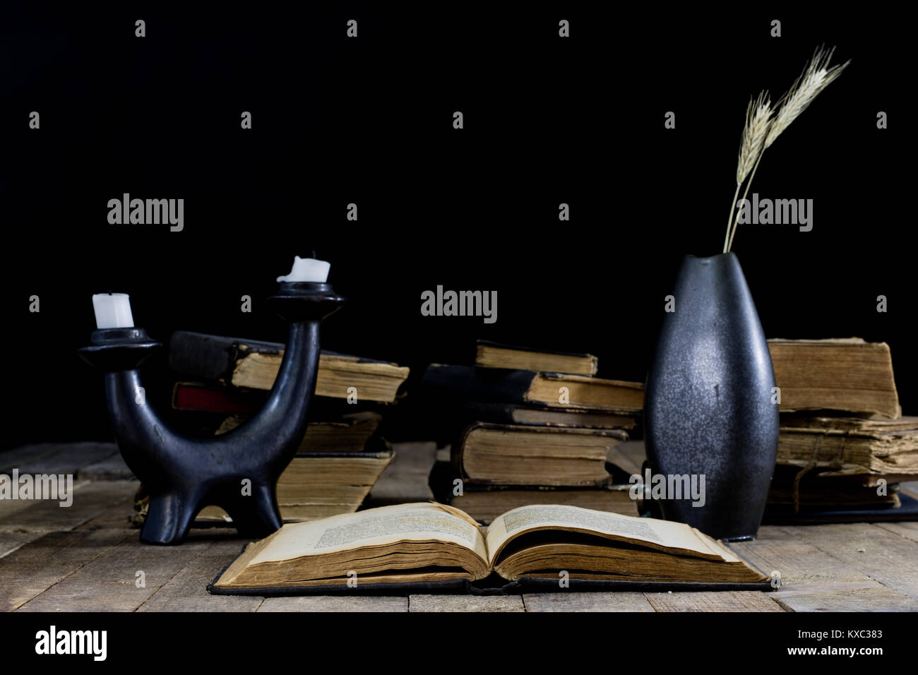 Old destroyed books on a wooden table. Reading room library with very ...