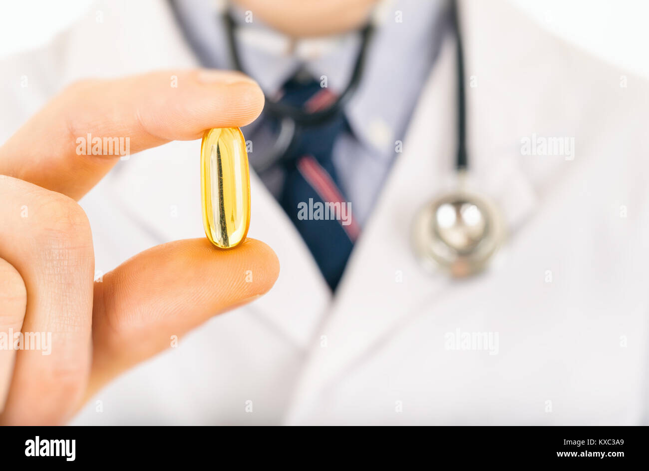 Big yellow pill hi-res stock photography and images - Alamy