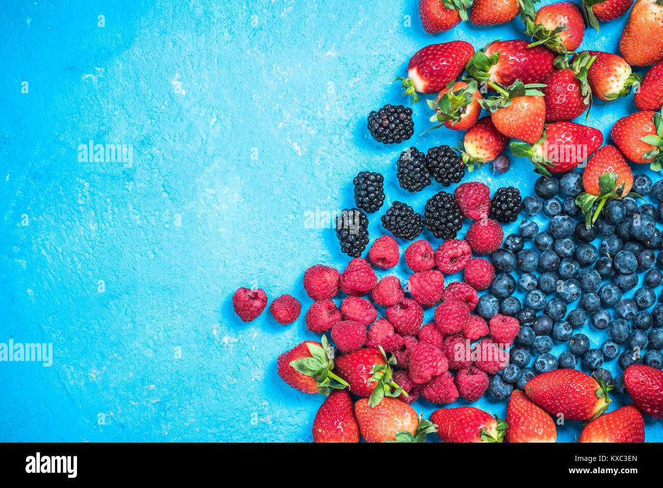 Market fresh mixed berry fruits, top view, border background Stock ...