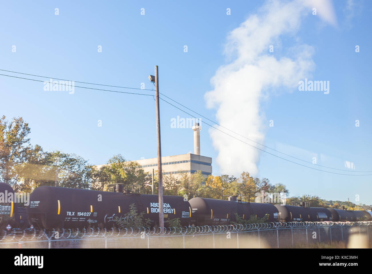 Burke, USA - October 27, 2017: Railroad with industrial plant, smoke ...