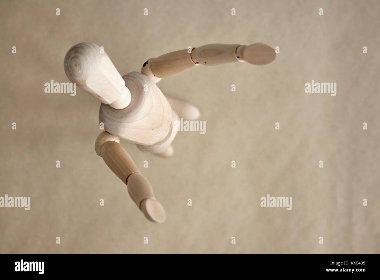 A studio photo of a wooden toy mannequin Stock Photo - Alamy