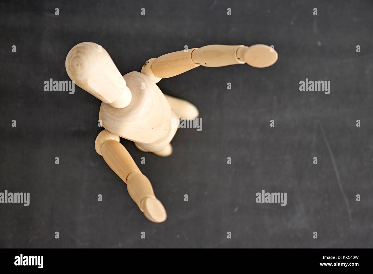 A studio photo of a wooden toy mannequin Stock Photo - Alamy