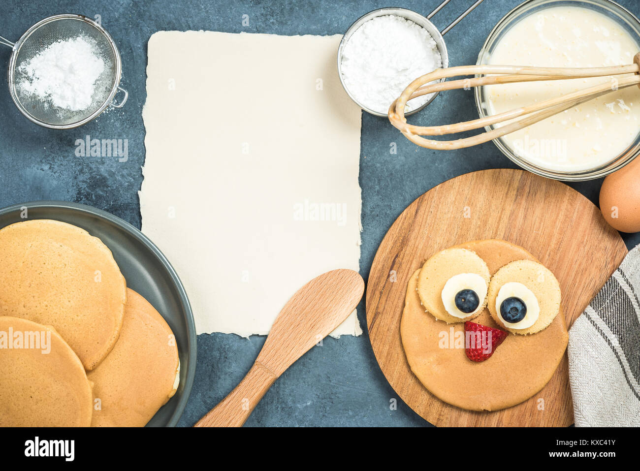 Recipe for pancakes with funny face for kids Stock Photo - Alamy