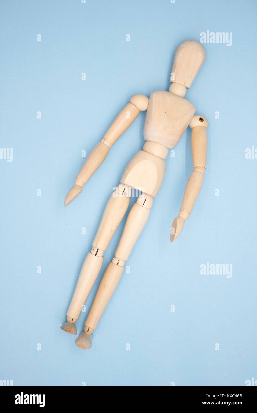 A studio photo of a wooden toy mannequin Stock Photo - Alamy