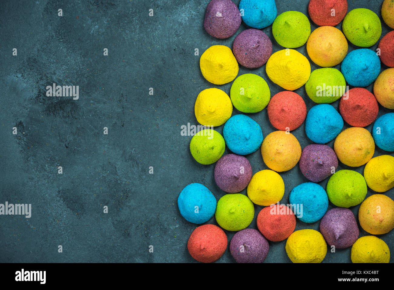 Vibrant marshmallow sweets flat lay on concrete slate Stock Photo - Alamy