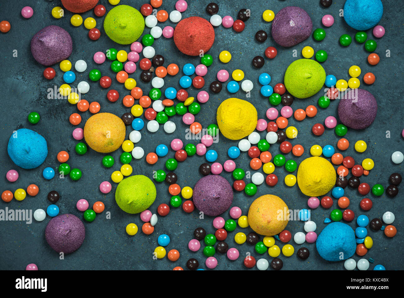 Colorful and vibrant sweets candy on concrete slate, top view Stock ...