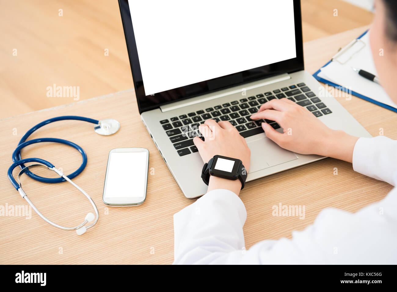 online service doctor wearing smartwatch working and using mobile ...