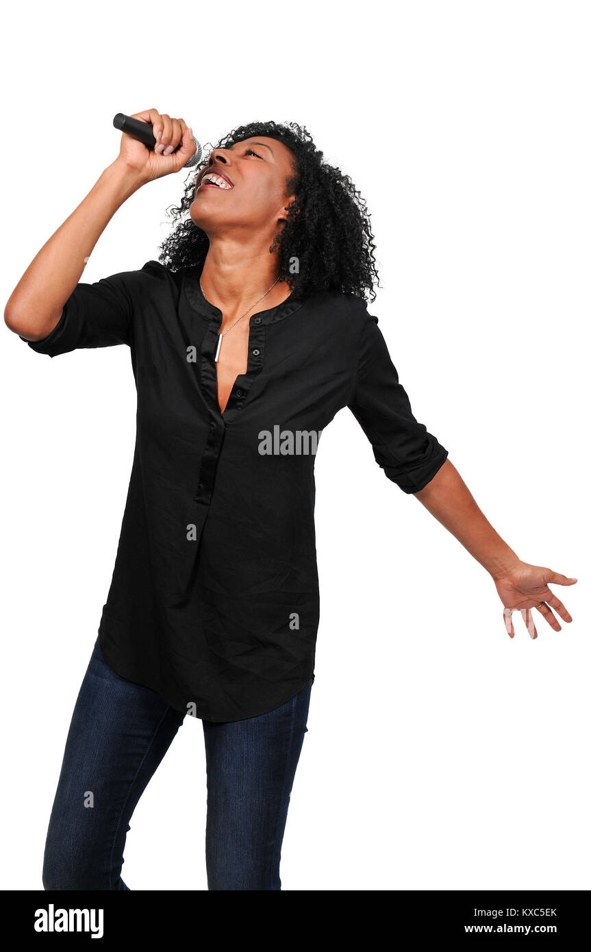 Beautiful woman singer performing at a concert Stock Photo - Alamy