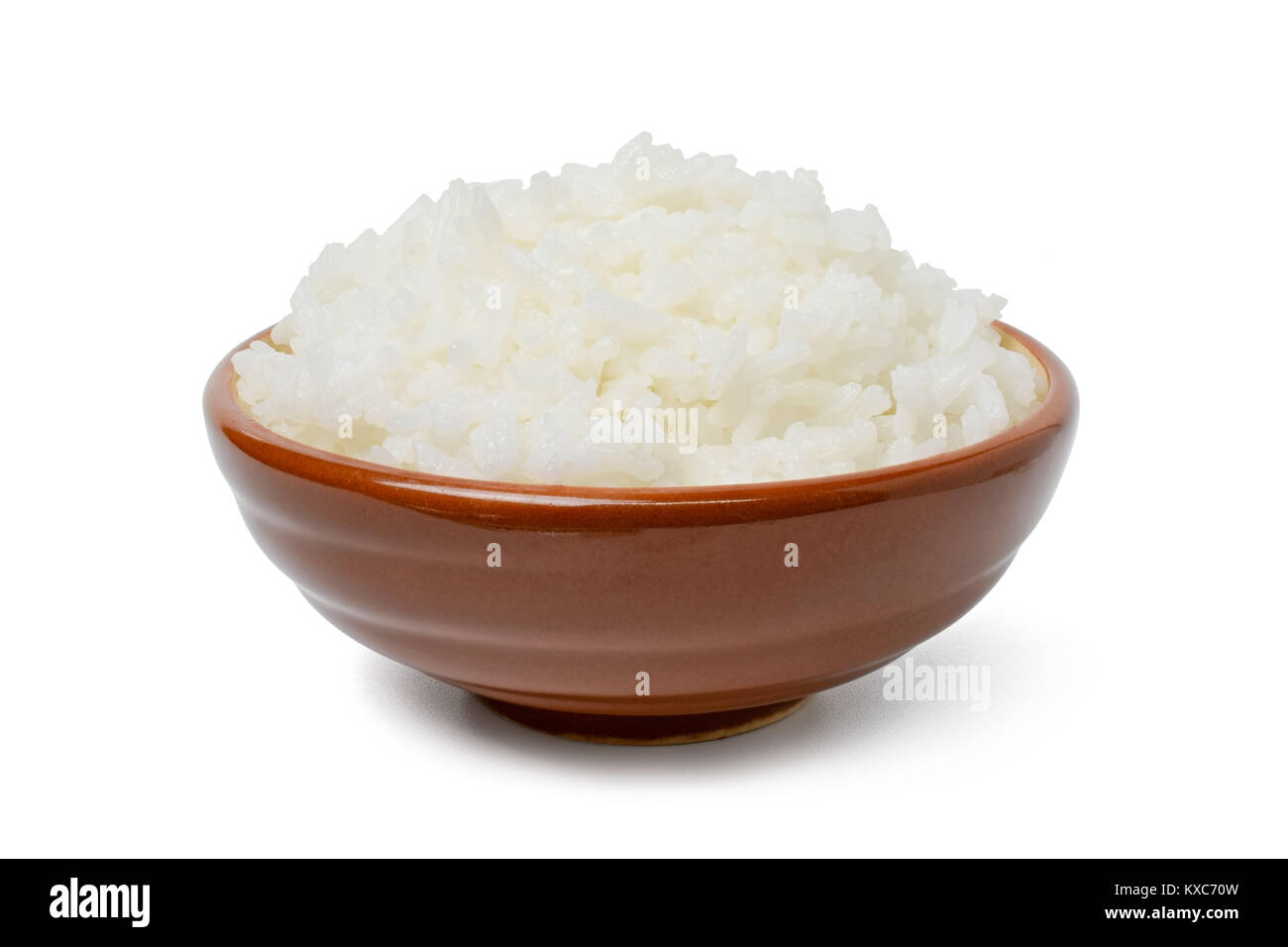 bowl of boiled rice isolated on a white background with clipping path ...
