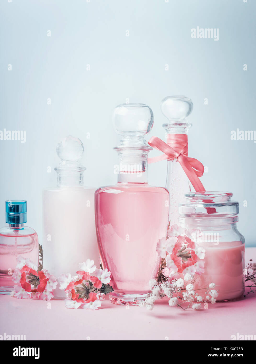 Perfume and cosmetics fleeting scents in pastel color . Composition of ...