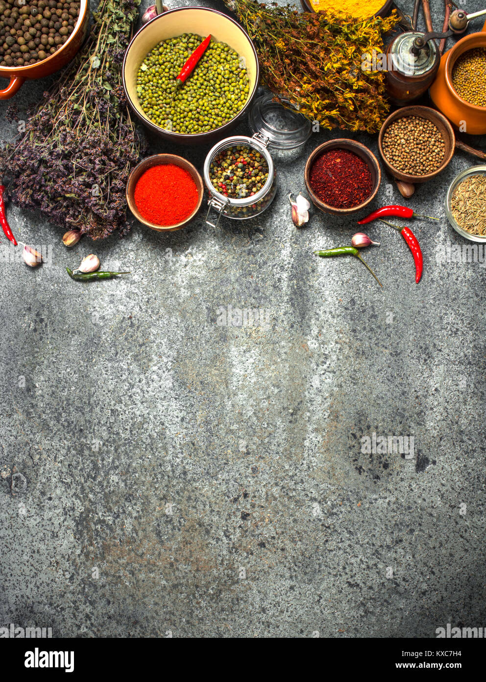 Various spicy spices and herbs. On a rustic background Stock Photo - Alamy