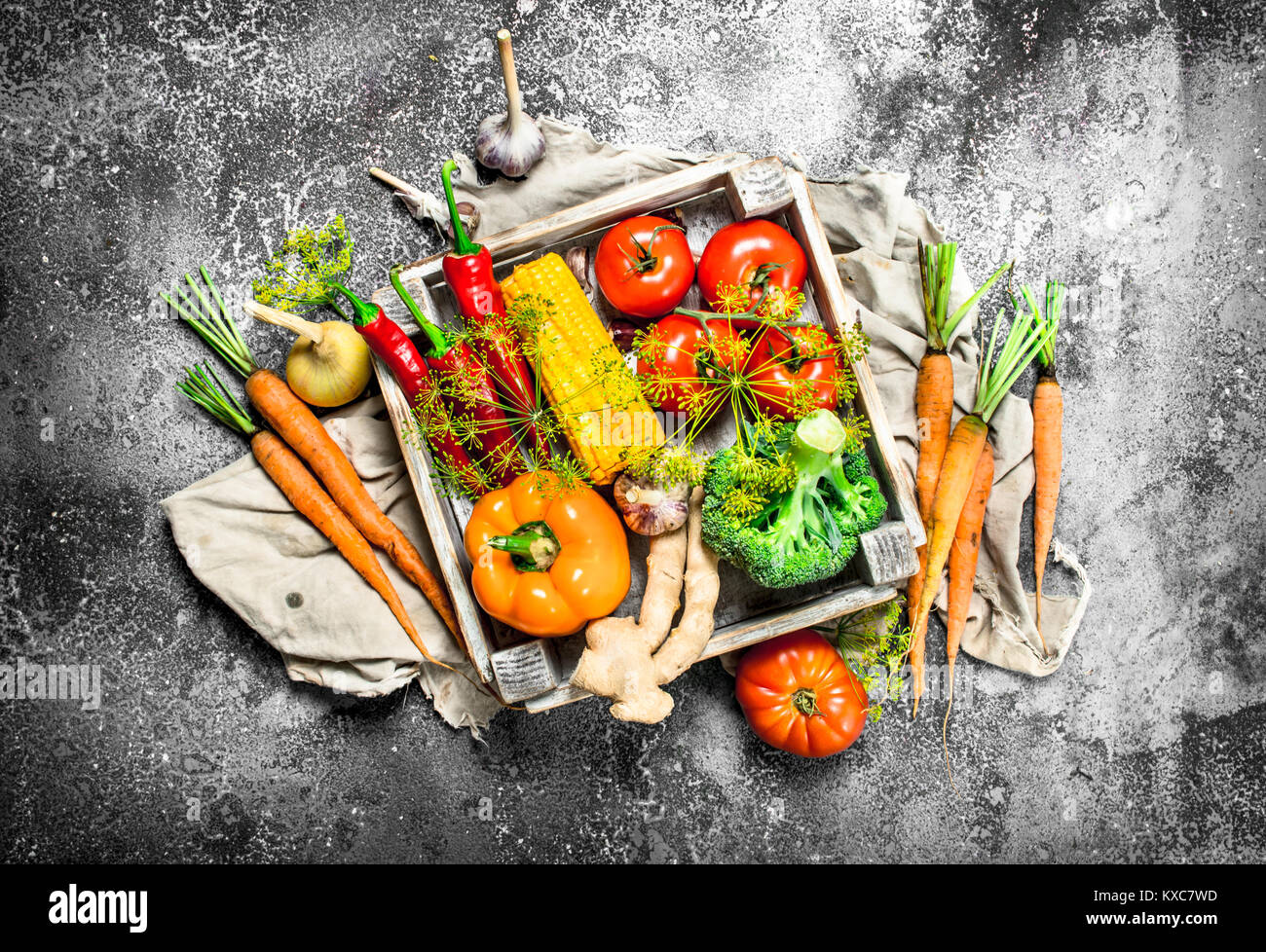 Organic food. Fresh harvest of vegetables and fruits. On a rustic ...