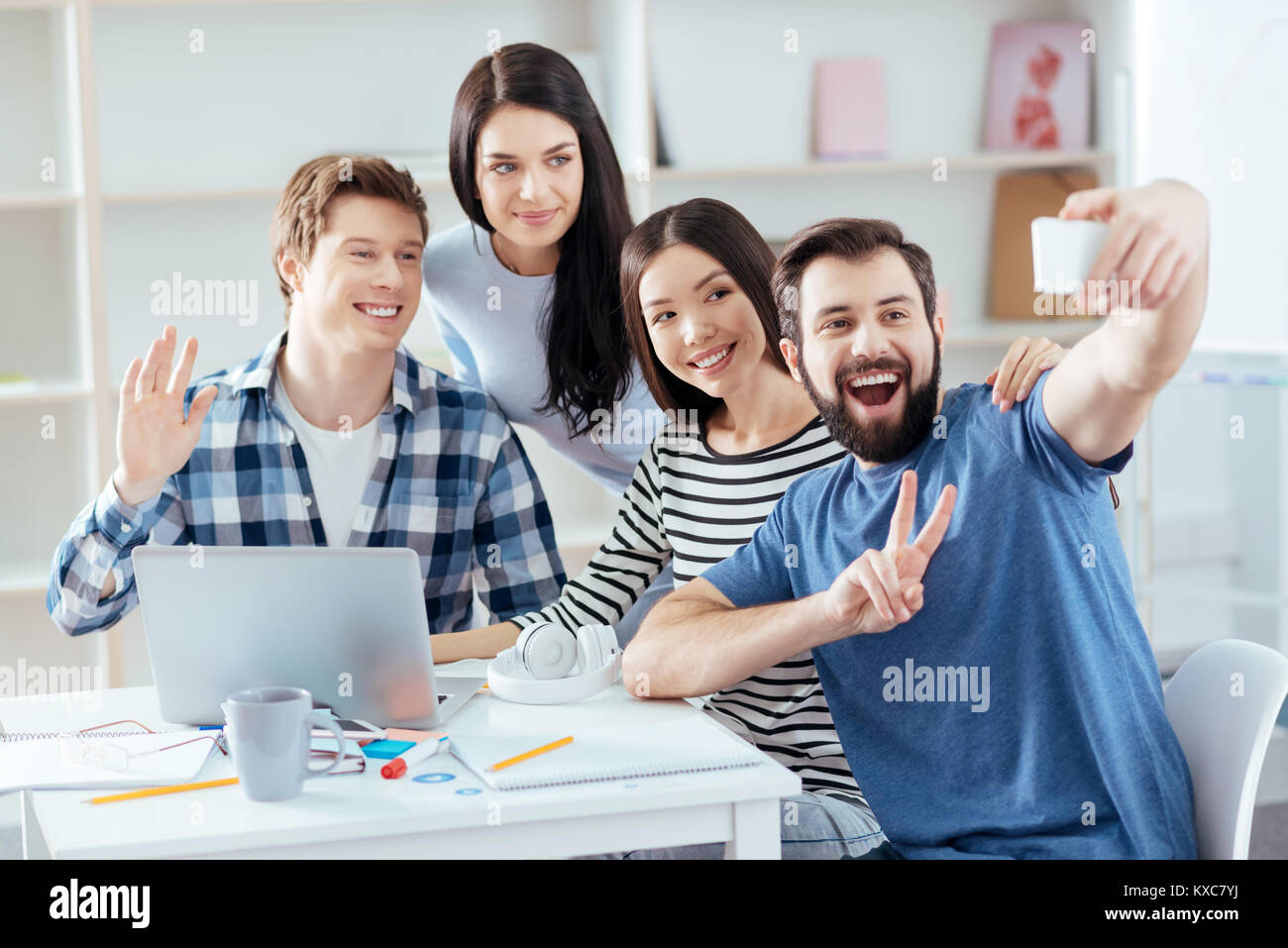 Budding four colleagues collecting memory Stock Photo - Alamy