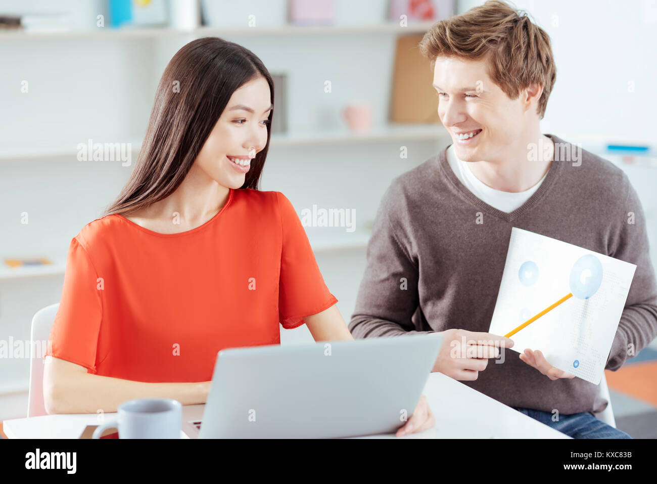 Appealing two students discussing numbers Stock Photo - Alamy Appealing two students discussing numbers Stock Photo - Alamy