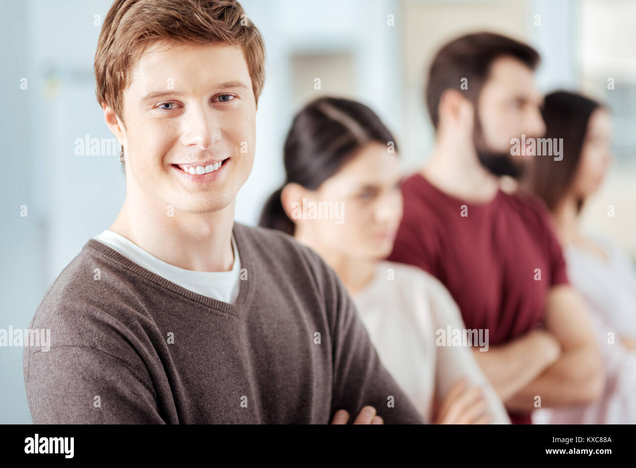 Happy cheerful man realizing himself Stock Photo - Alamy