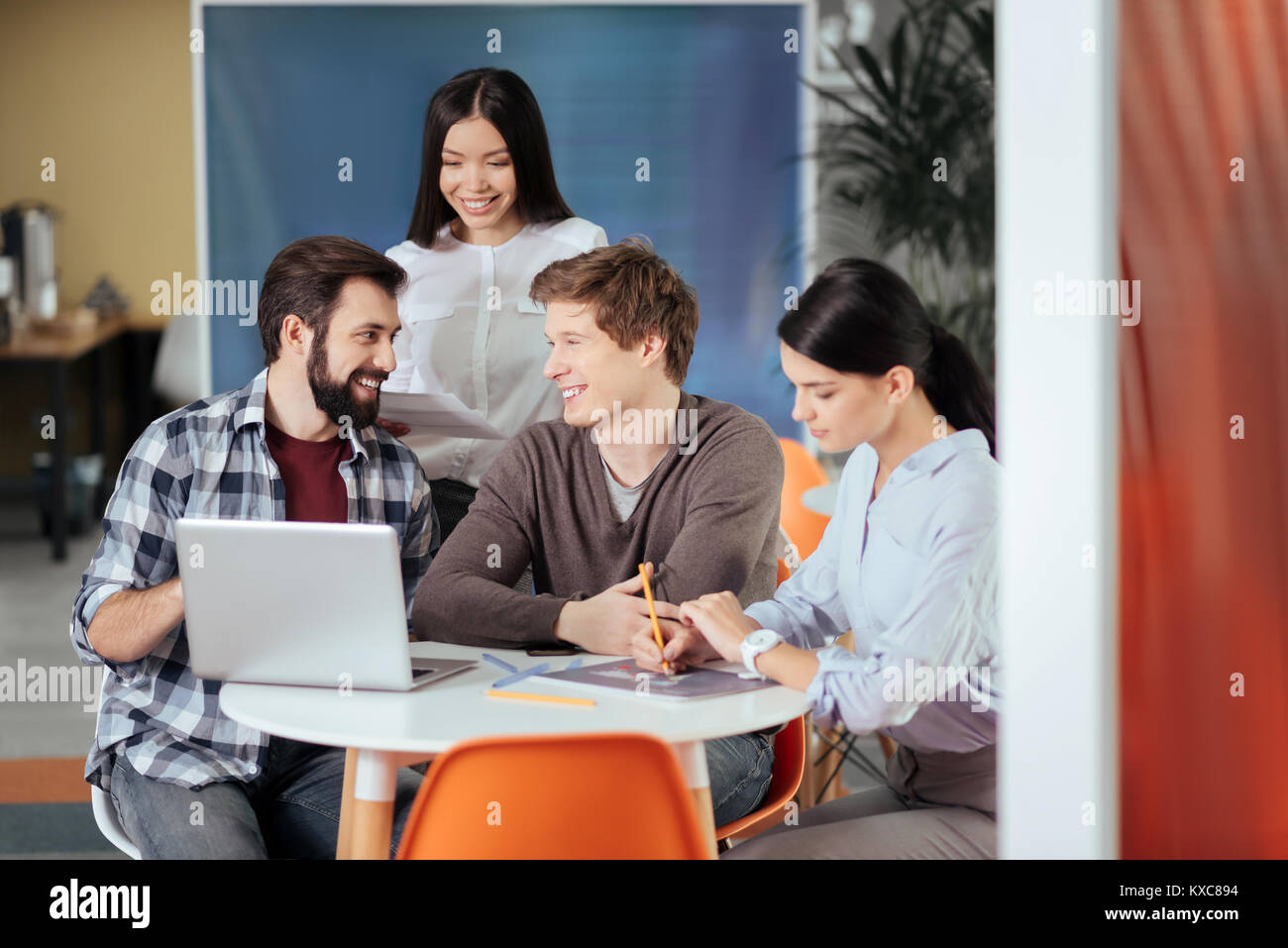 Colleagues debating hi-res stock photography and images - Alamy