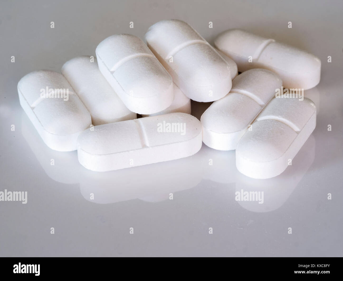 Closeup of pile of tablets Stock Photo - Alamy